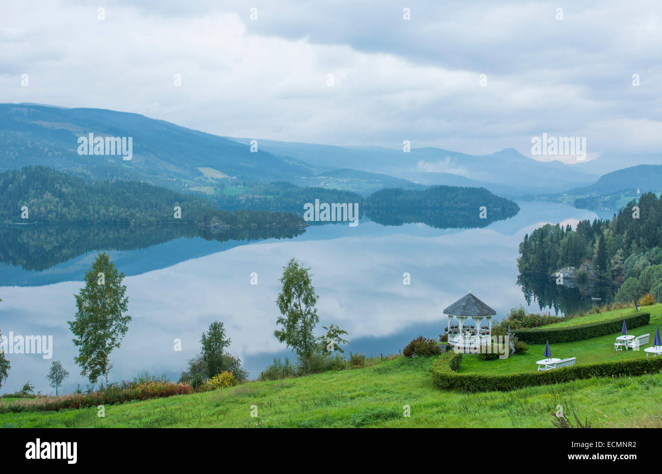 Lomen Norway beautiful reflections on setting at resort on water called ...