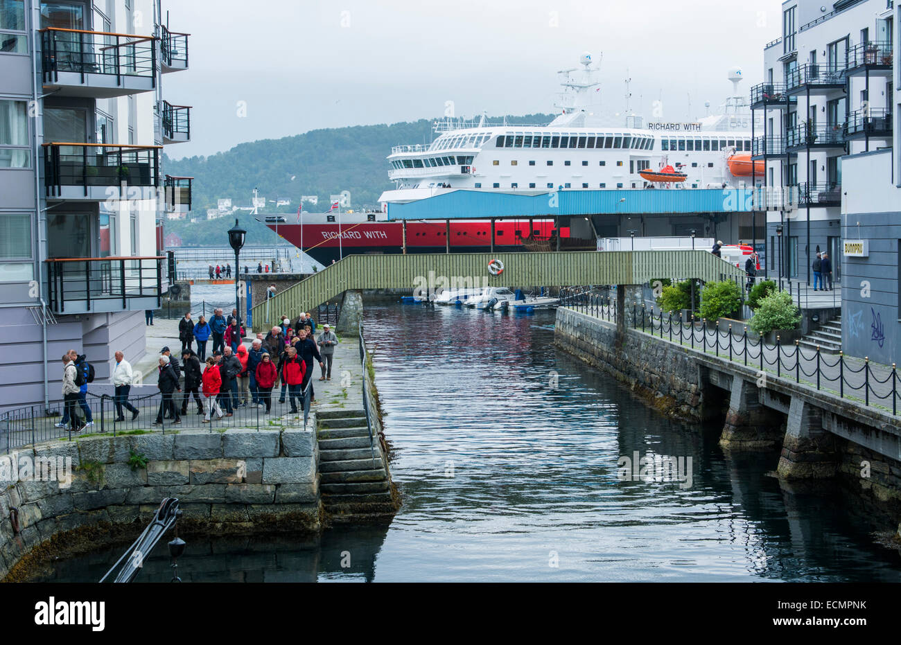 Alesund Norway cruise Hurtigruten water with boats near pier and homes ...