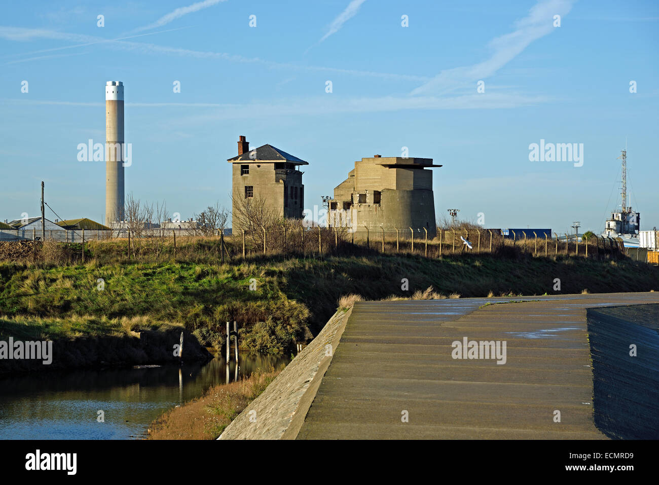 The seawall and World War 2 buildings at Sheerness Docks, Sheppey, Kent ...