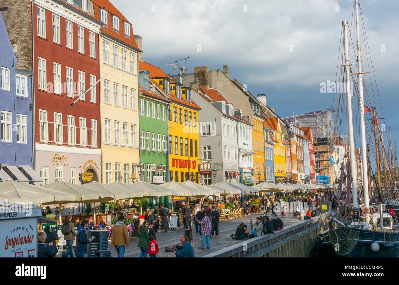Copenhagen Denmark famous Nyhavn color homes and boats with crowds ...