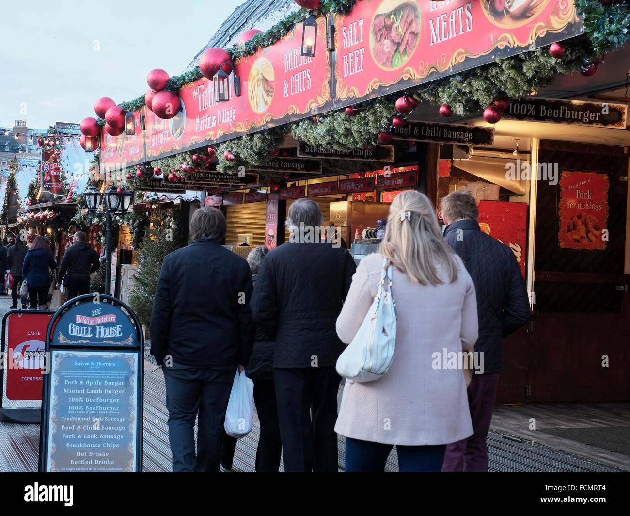 Customers footfall walking by stall stalls markets trading britain hi ...