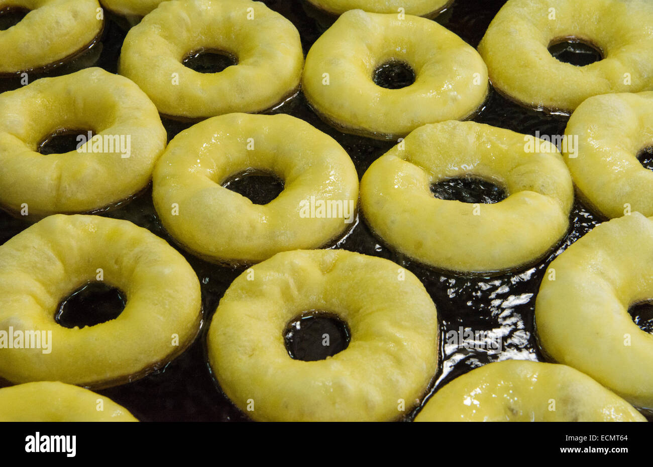 Rabat Morocco main medina close up of donuts in oil Stock Photo - Alamy