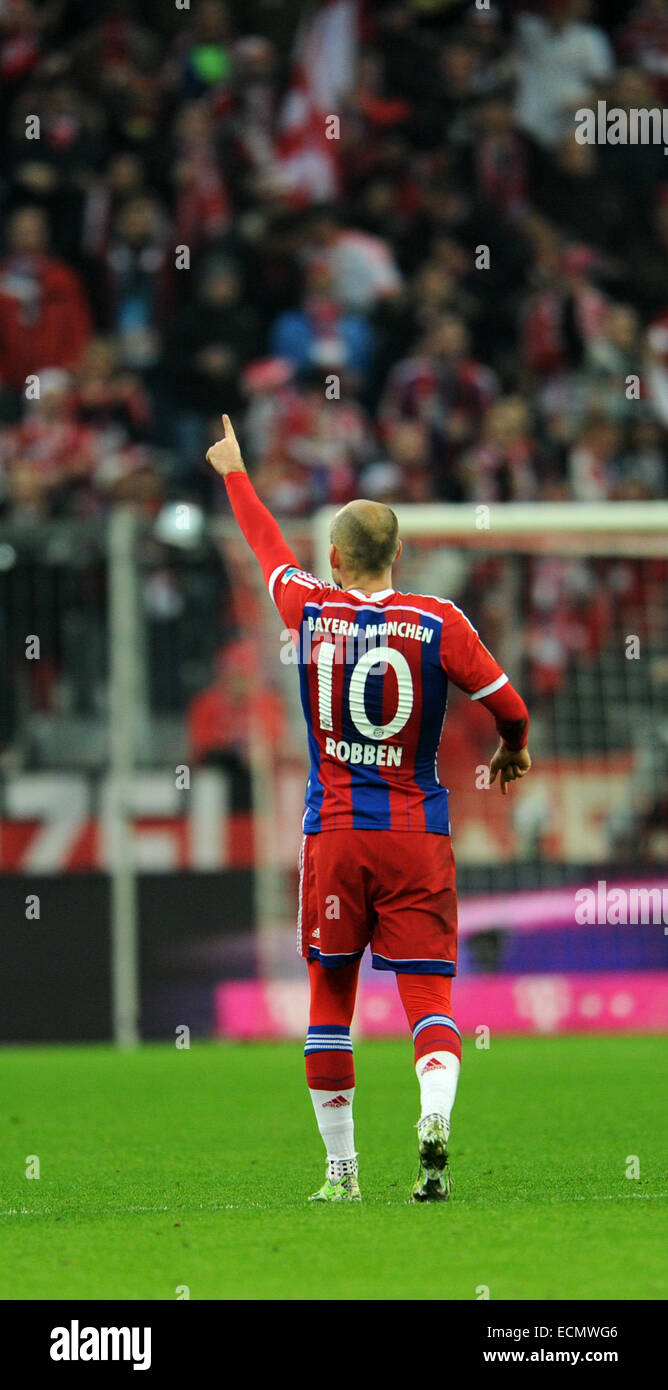 Munich's Arjen Robben cheers after his 1-0 goal during the German ...