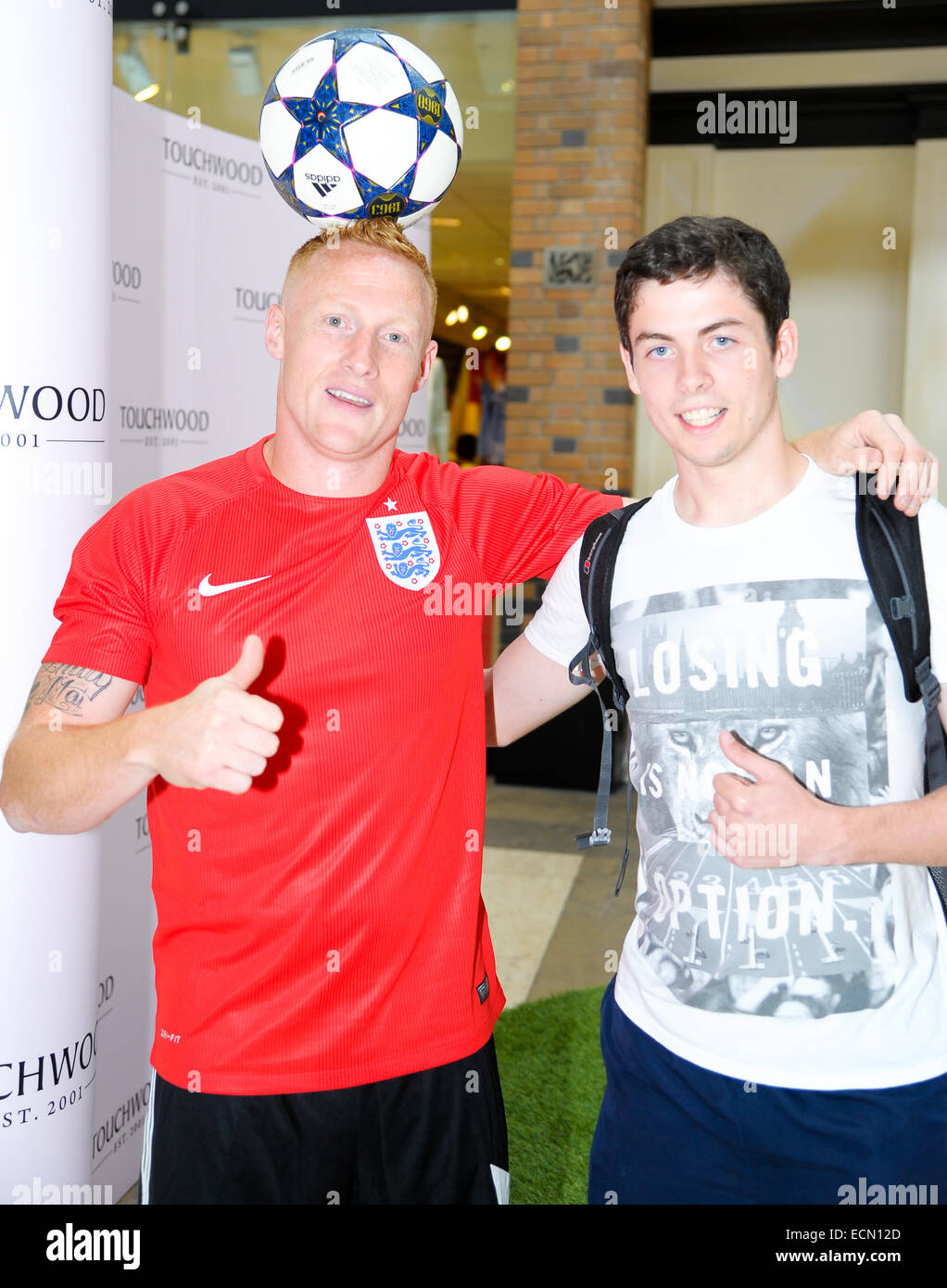 World-record holding football freestyler Dan Magness performs a series ...