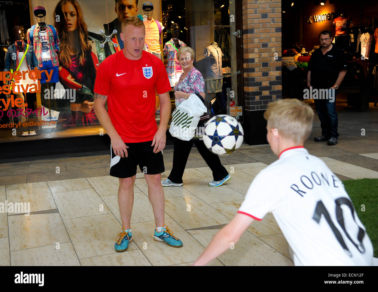 World-record holding football freestyler Dan Magness performs a series ...
