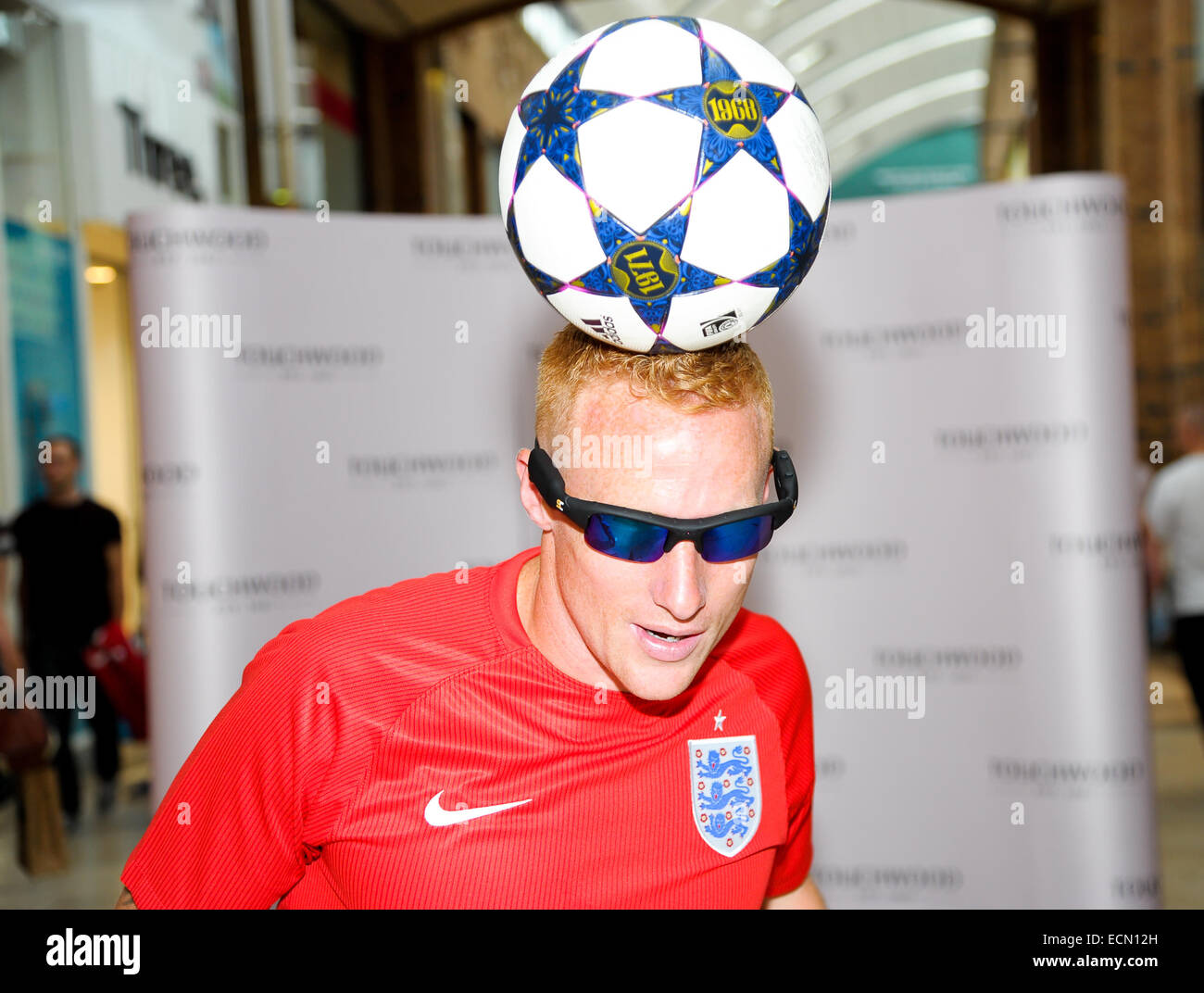 World-record holding football freestyler Dan Magness performs a series ...