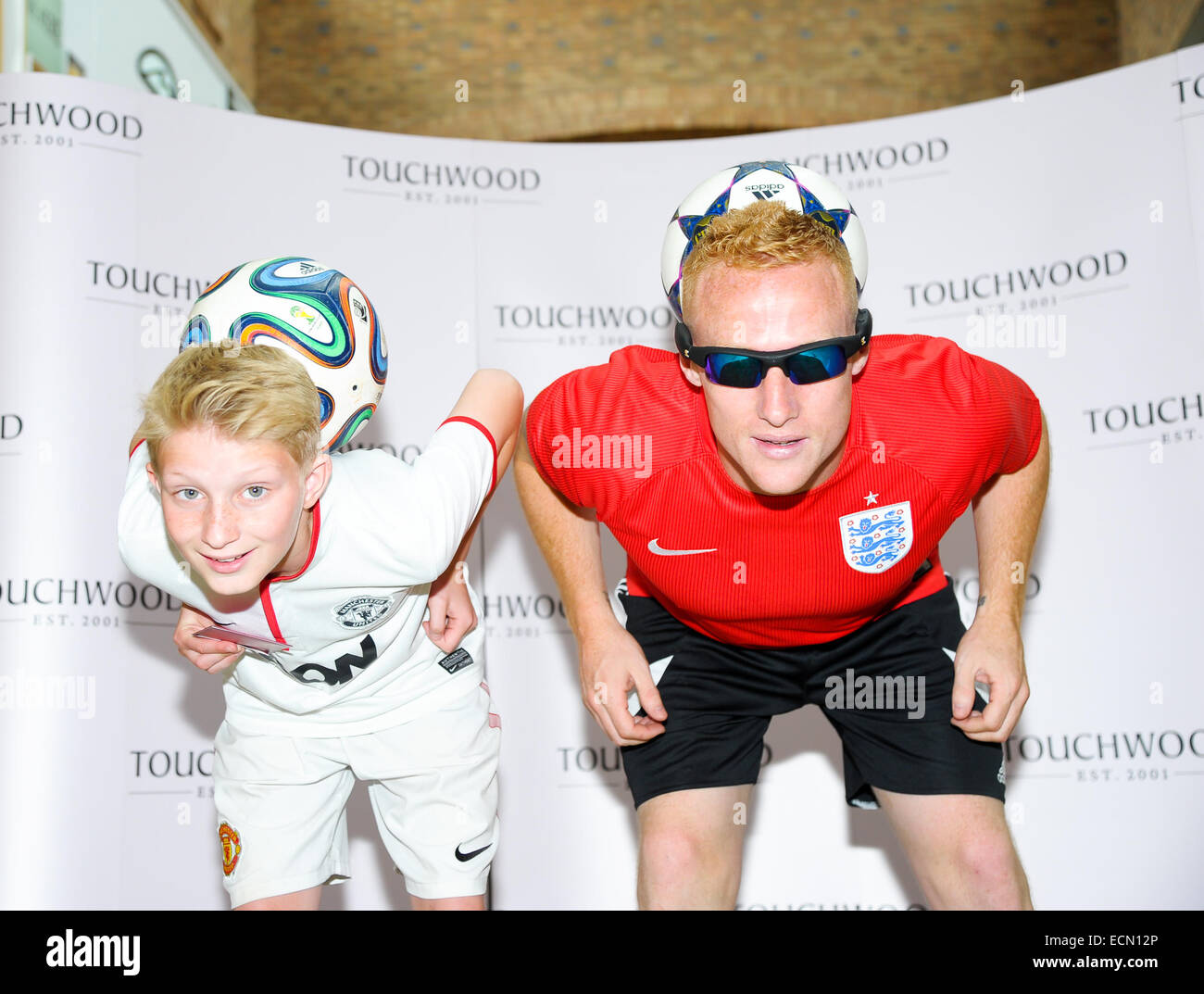 World-record holding football freestyler Dan Magness performs a series ...