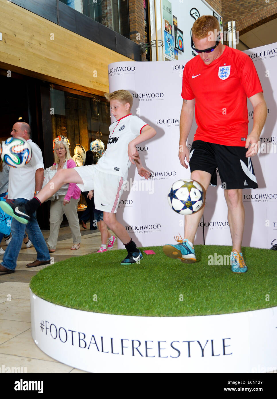 World-record holding football freestyler Dan Magness performs a series ...