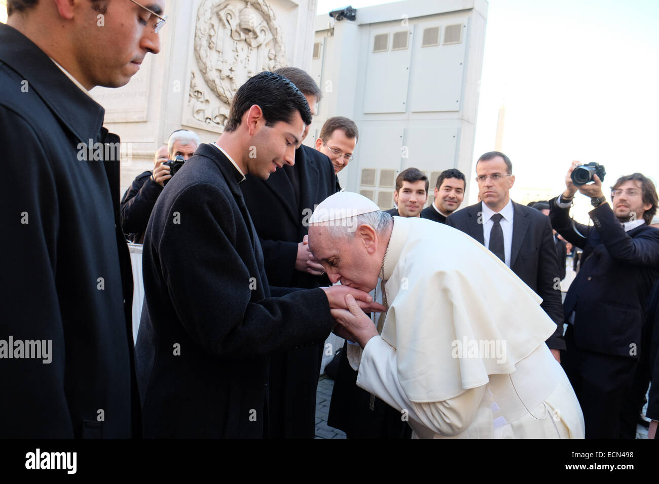 St. Peter's Square, Vatican City. 17th Dec, 2014. Pope Francis kiss the ...