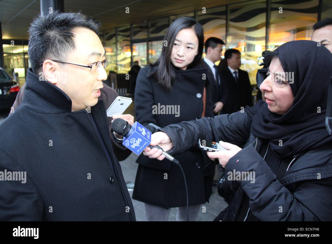 Geneva, Switzerland. 17th Dec, 2014. Wang Qun (L), director-general of ...