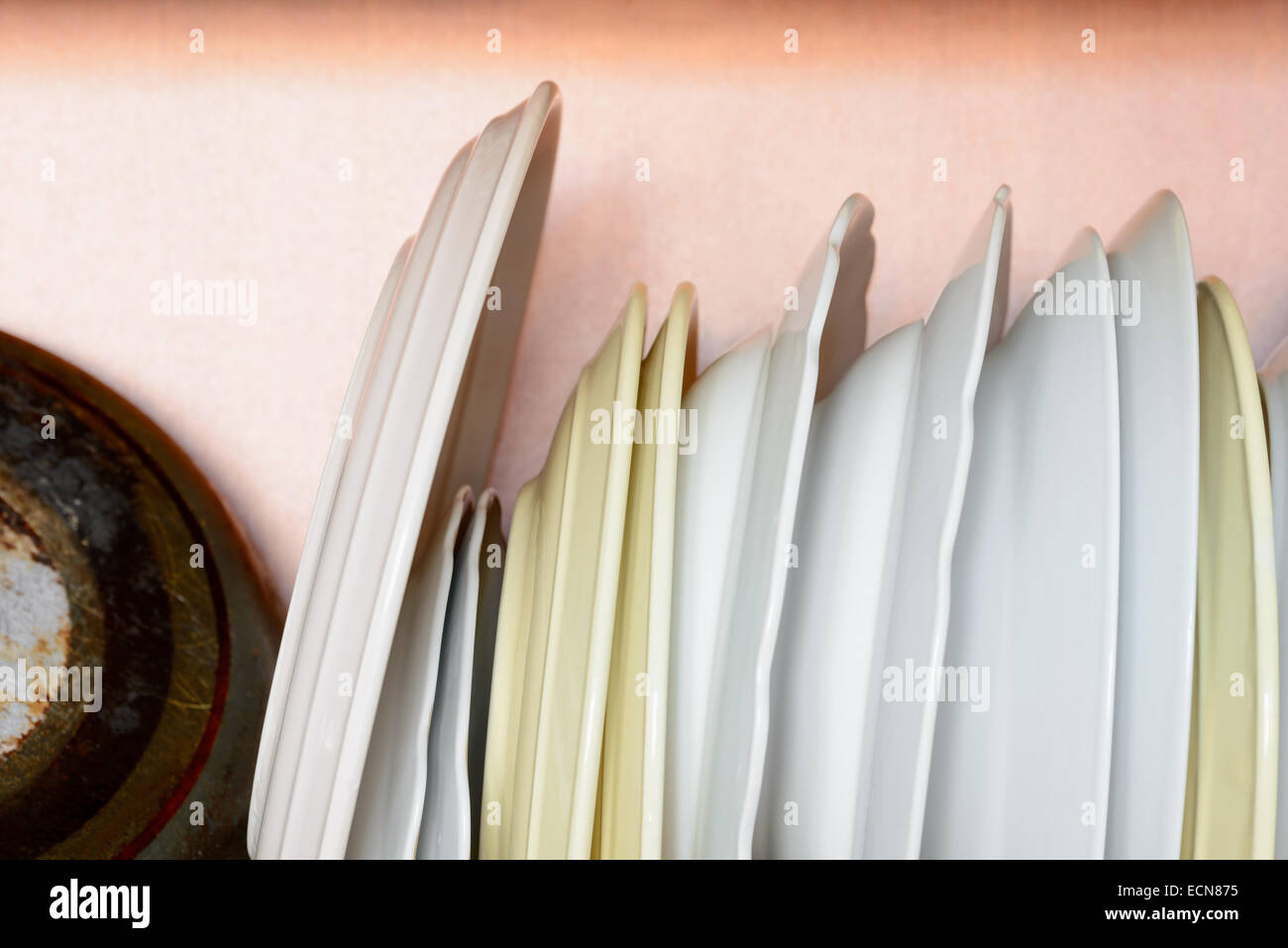 Drying dishes and pan in the dish rack Stock Photo - Alamy