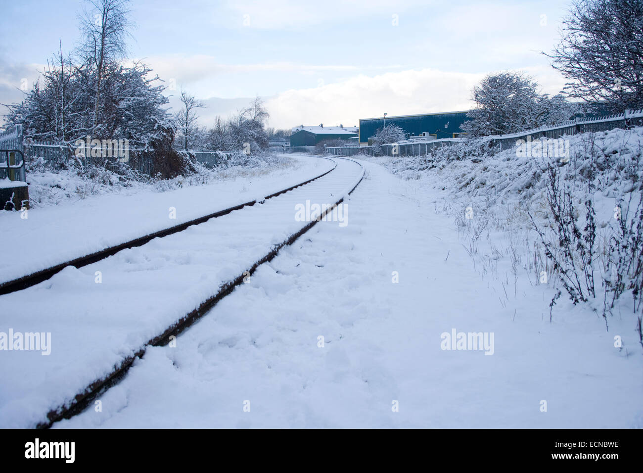 Railway line covered in snow Stock Photo - Alamy