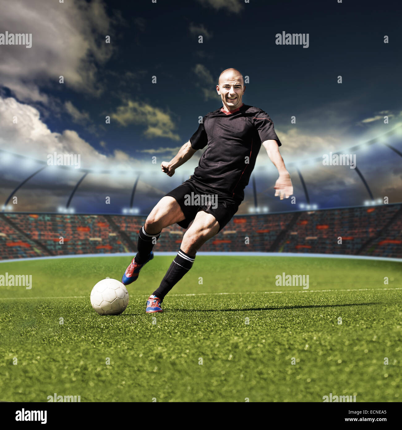 two football players from opposing team on the field Stock Photo - Alamy