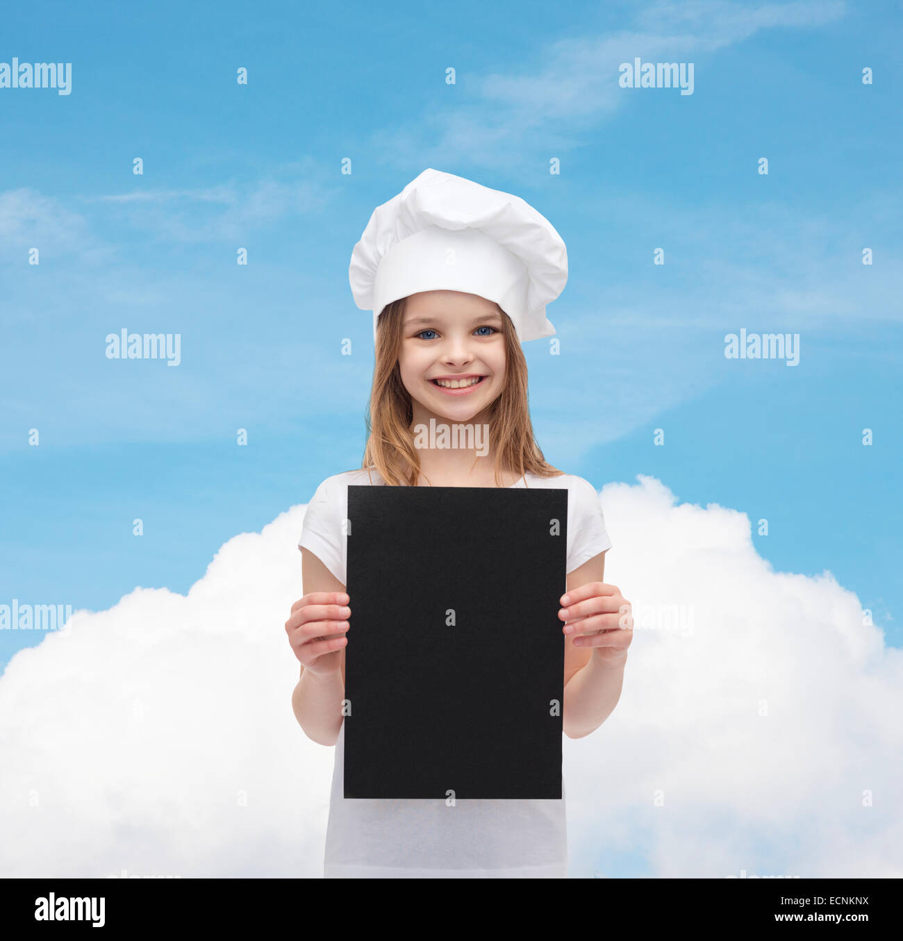 little cook or baker with blank black paper Stock Photo - Alamy