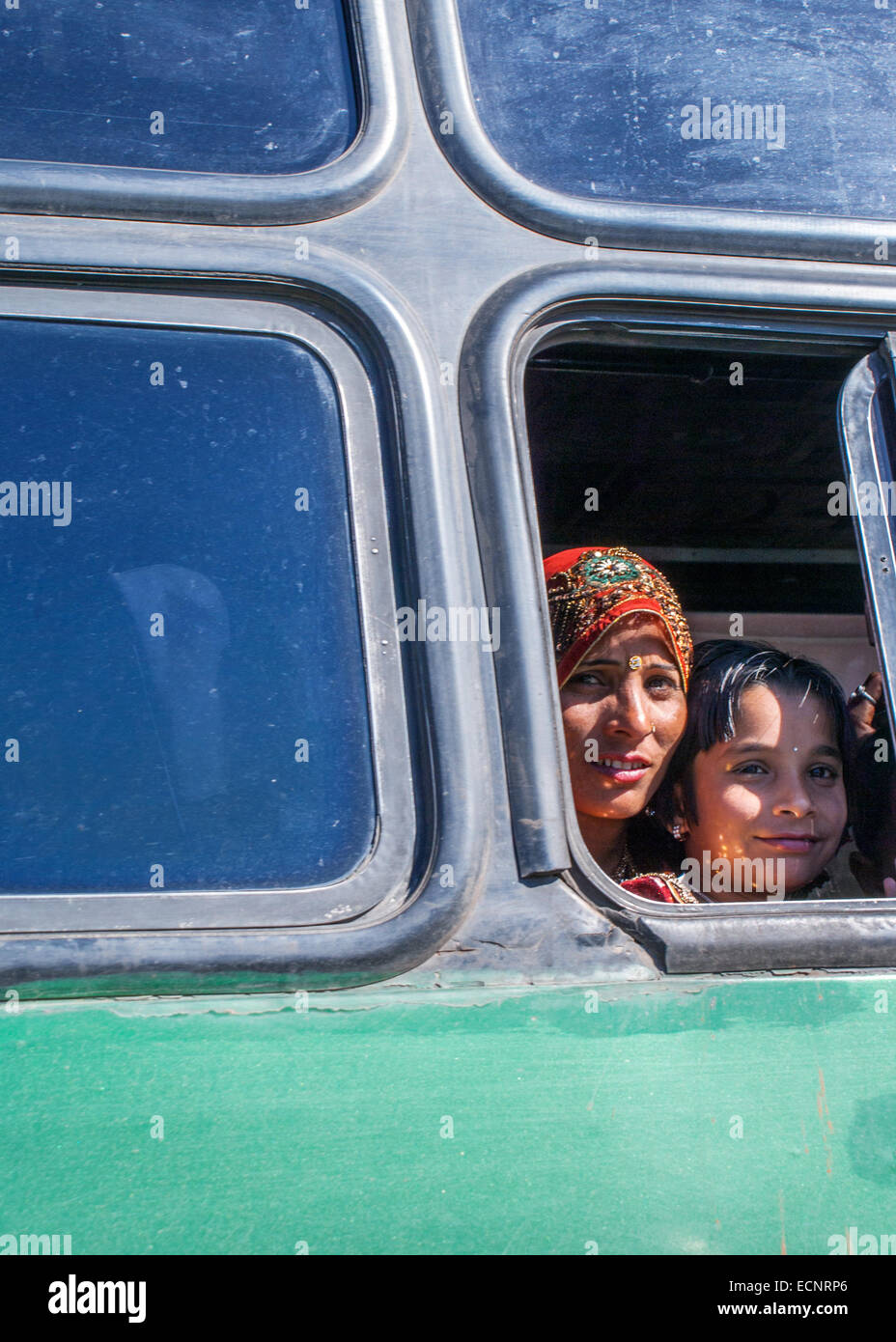 Mother and daughter look out bus window Stock Photo - Alamy