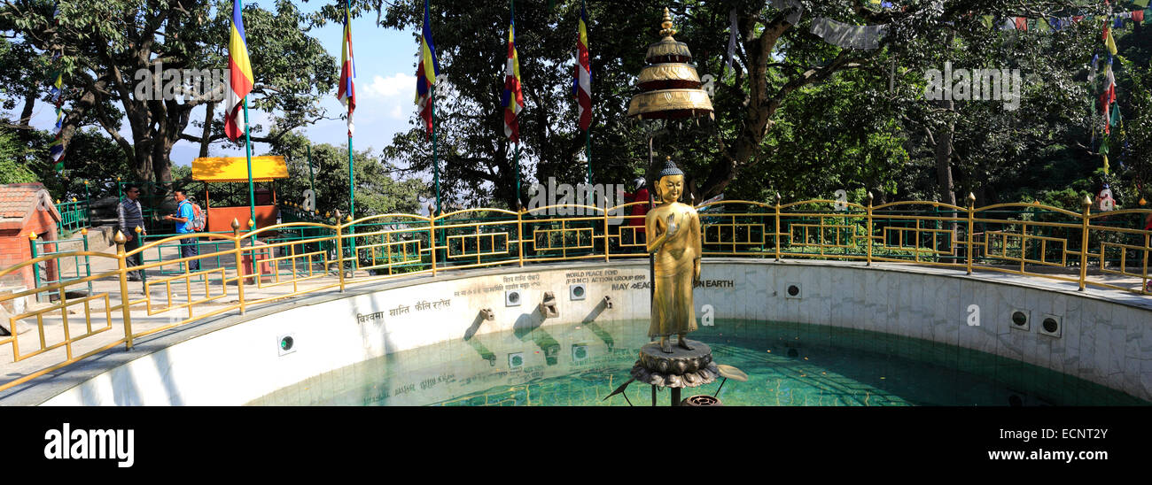 Golden statue of Buddha in the World Peace Pond, Monkey Temple, UNESCO ...