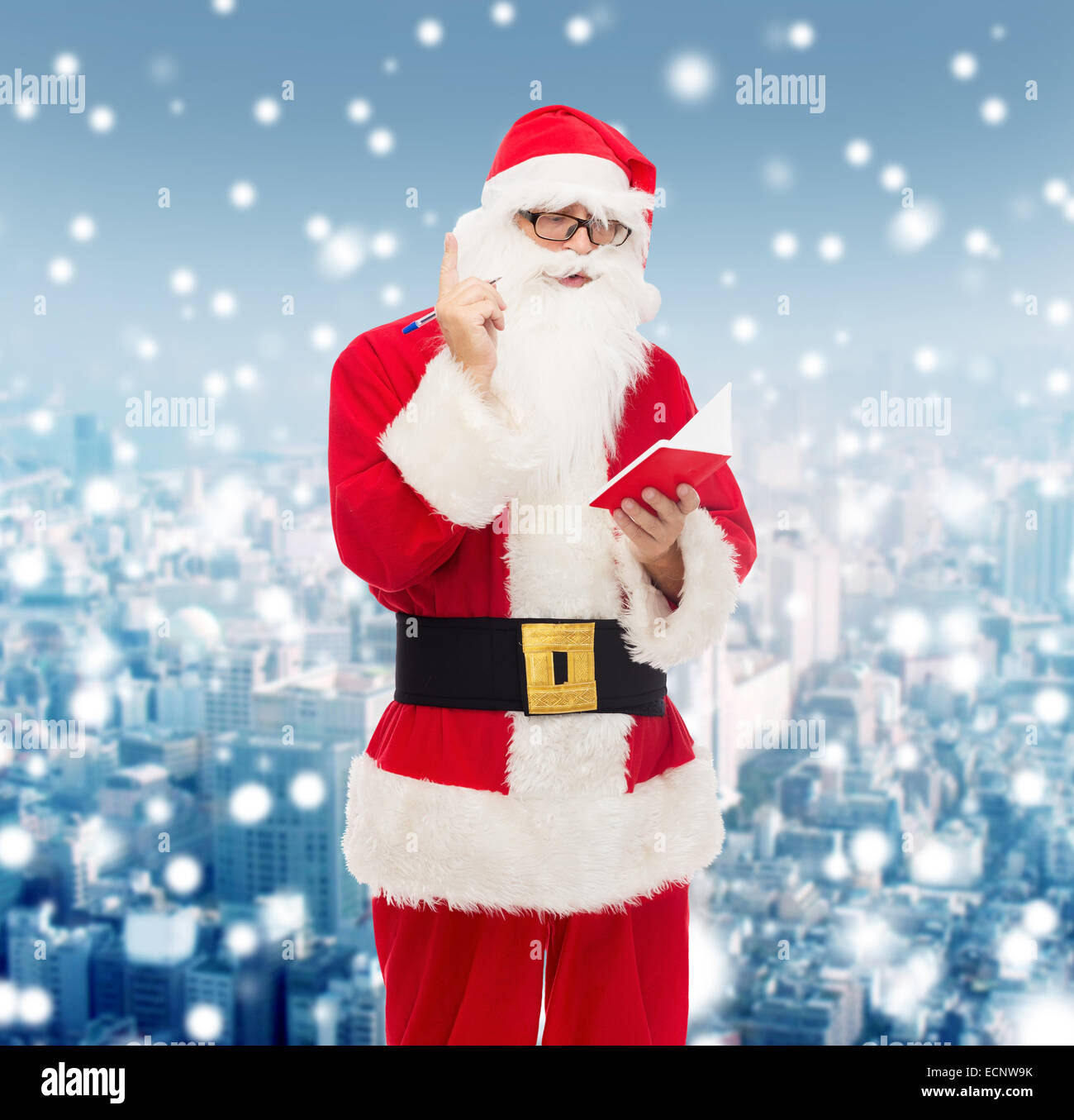 man in costume of santa claus with notepad Stock Photo - Alamy