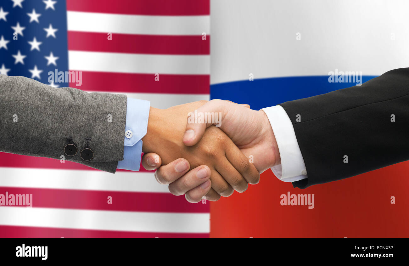 handshake over american and russian flags Stock Photo - Alamy