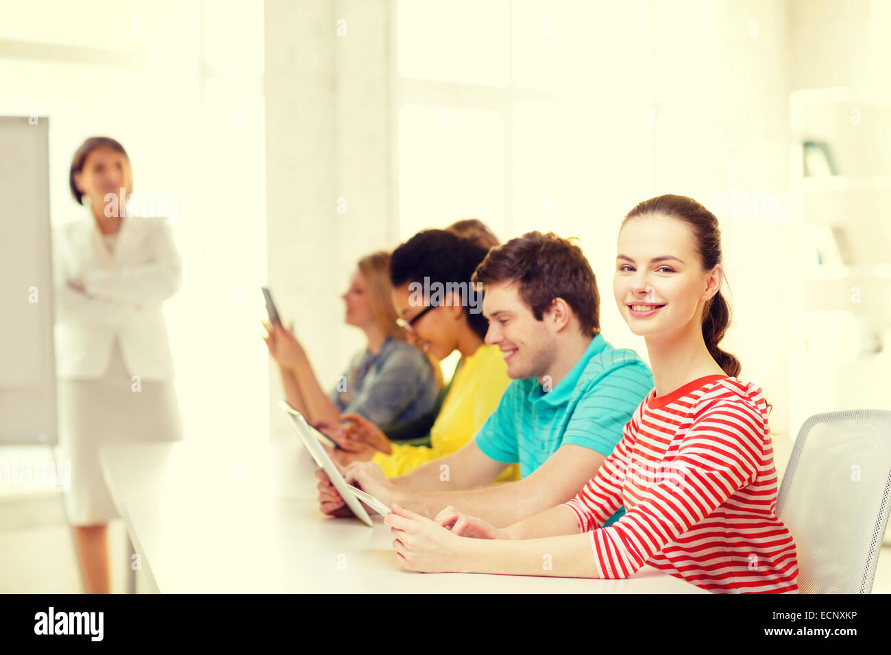 female student with classmates in computer class Stock Photo - Alamy