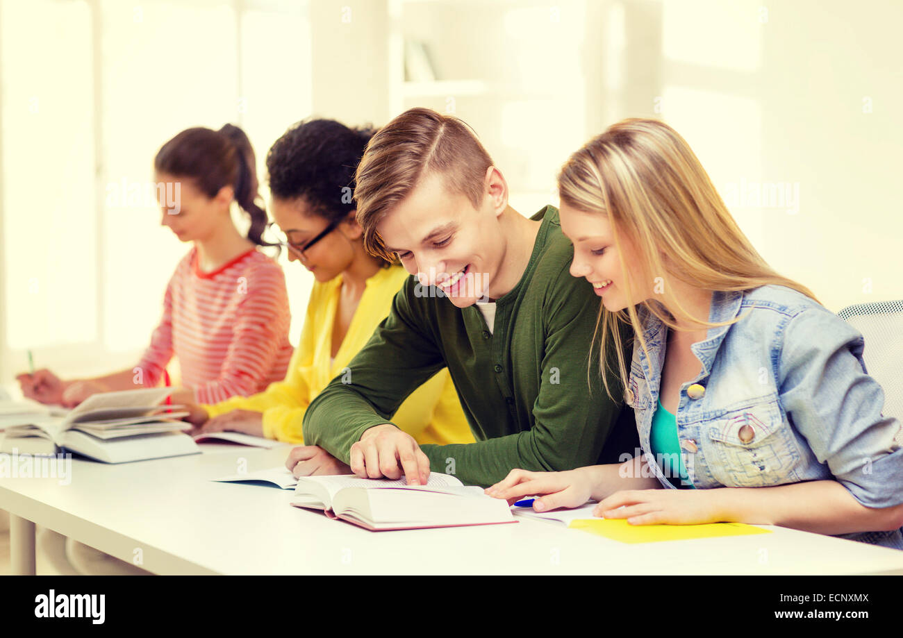 students with textbooks and books at school Stock Photo - Alamy