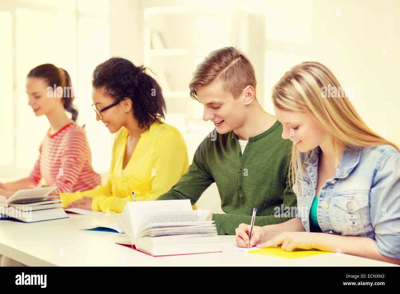 students with textbooks and books at school Stock Photo - Alamy