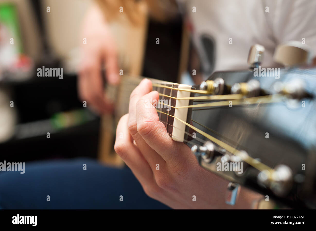 Playing acoustic guitar Stock Photo - Alamy