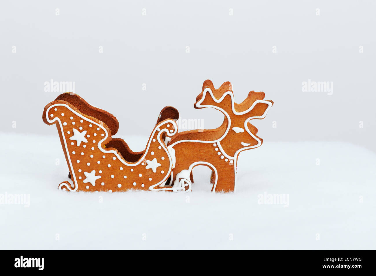 The hand-made eatable reindeer and cart with snow decoration Stock ...