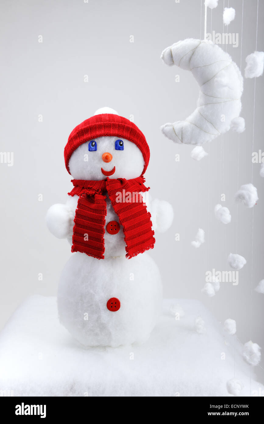 The snowman, artificial moon and snowflakes Stock Photo - Alamy