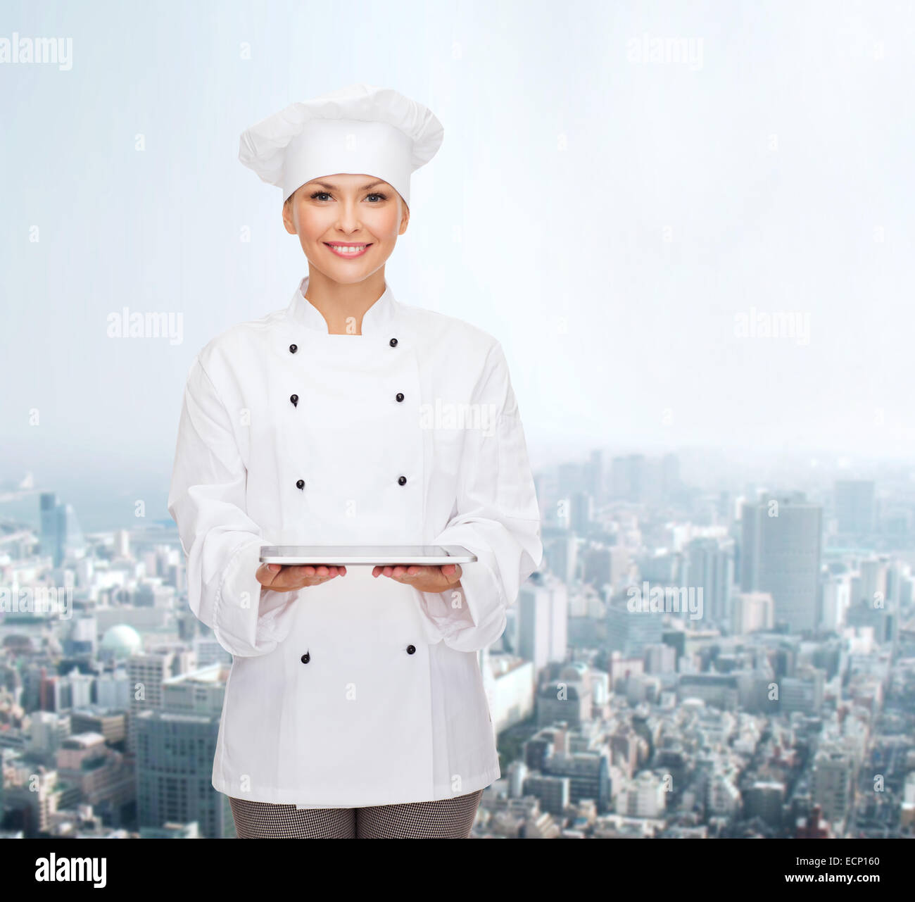 smiling female chef with tablet pc computer Stock Photo - Alamy