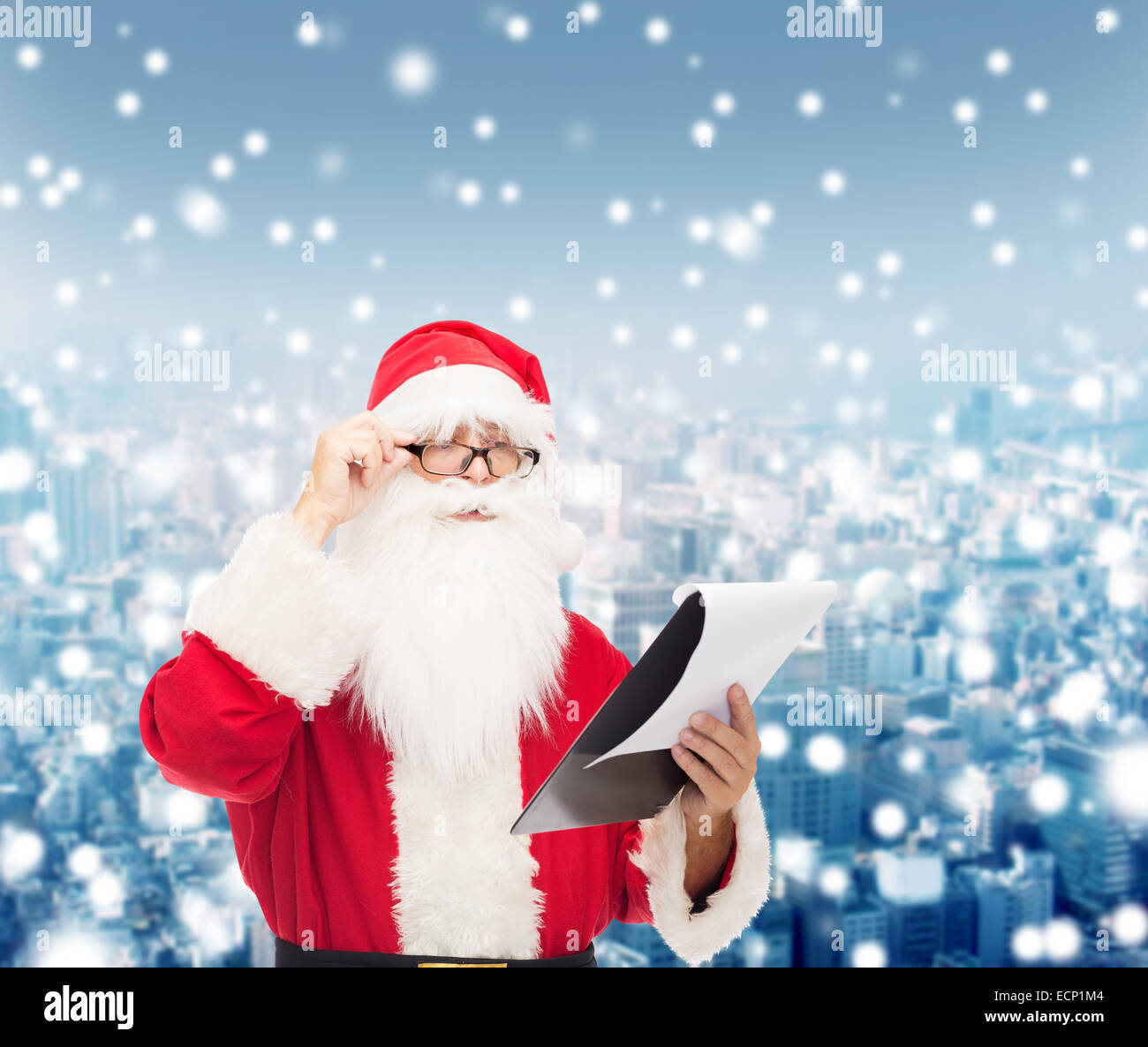 man in costume of santa claus with notepad Stock Photo - Alamy
