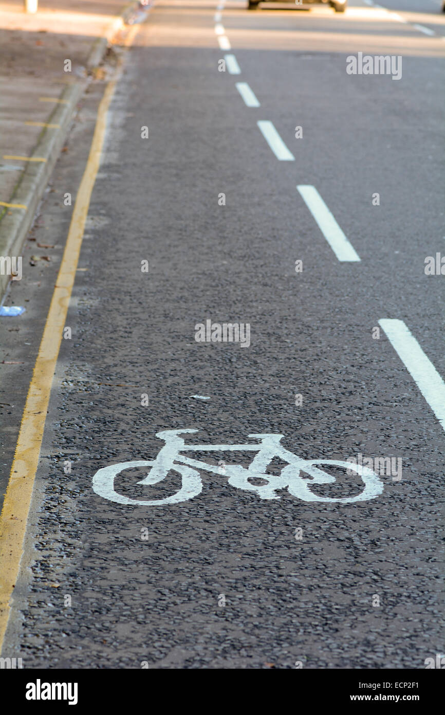 Bicycle symbol at start of cycle lane Stock Photo - Alamy