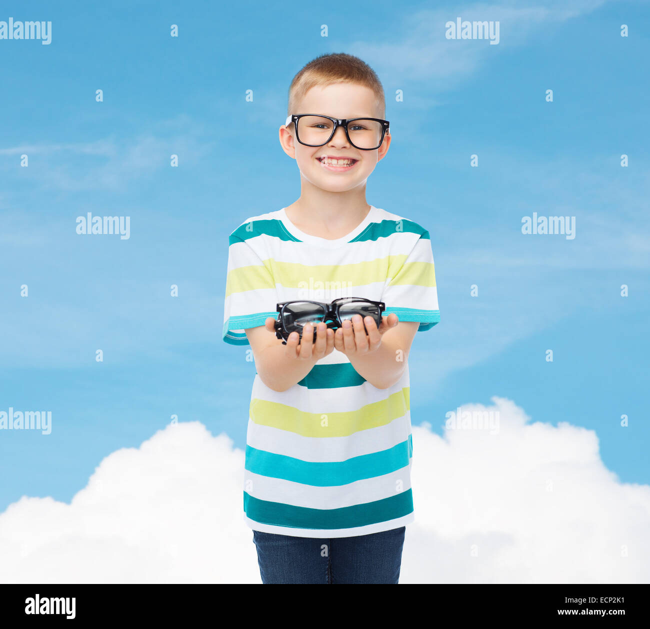 smiling boy in eyeglasses holding spectacles Stock Photo - Alamy