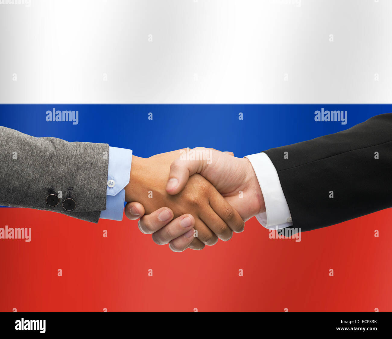 close up of handshake over russian flag Stock Photo - Alamy
