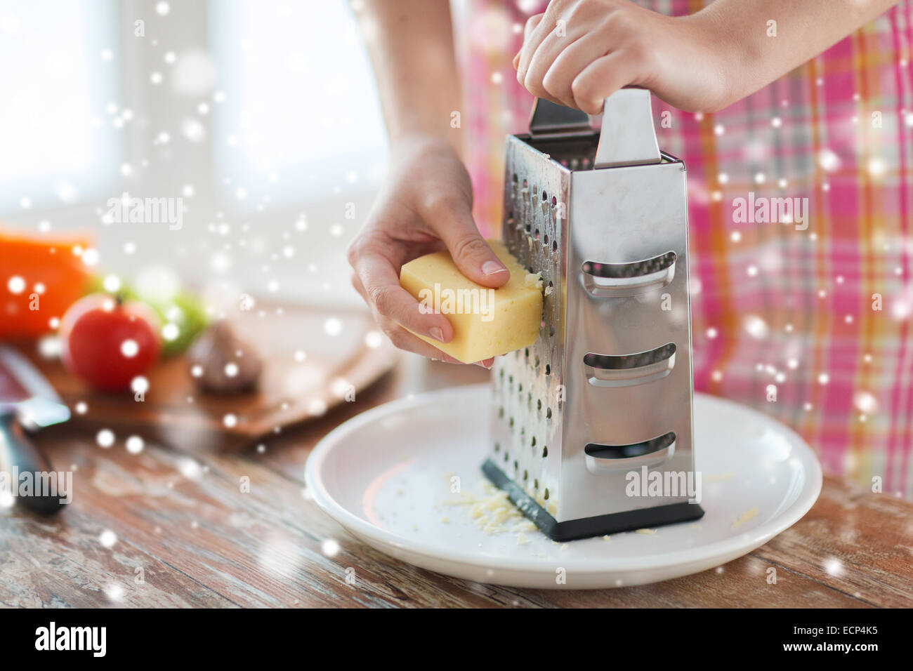 Grating cheese hi-res stock photography and images - Alamy