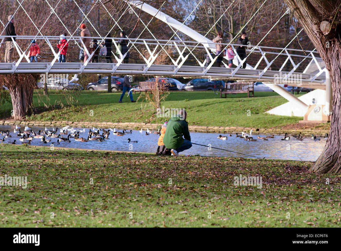 Man and daughter fishing along River Ouse, Bedford, England Stock Photo ...