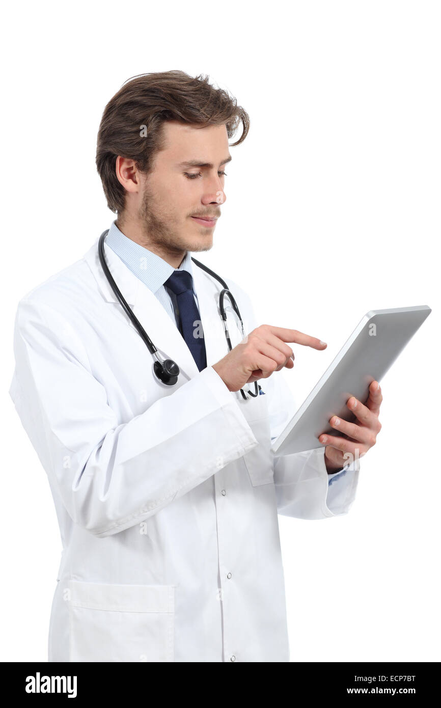 Serious doctor man browsing a tablet reader isolated on a white ...