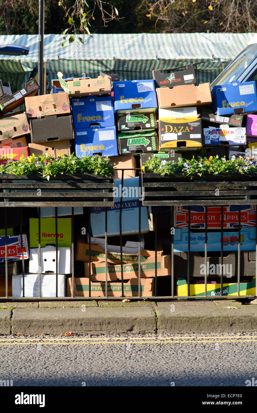 Cardboard fruit and vegetable boxes stacked at market stall Stock Photo ...