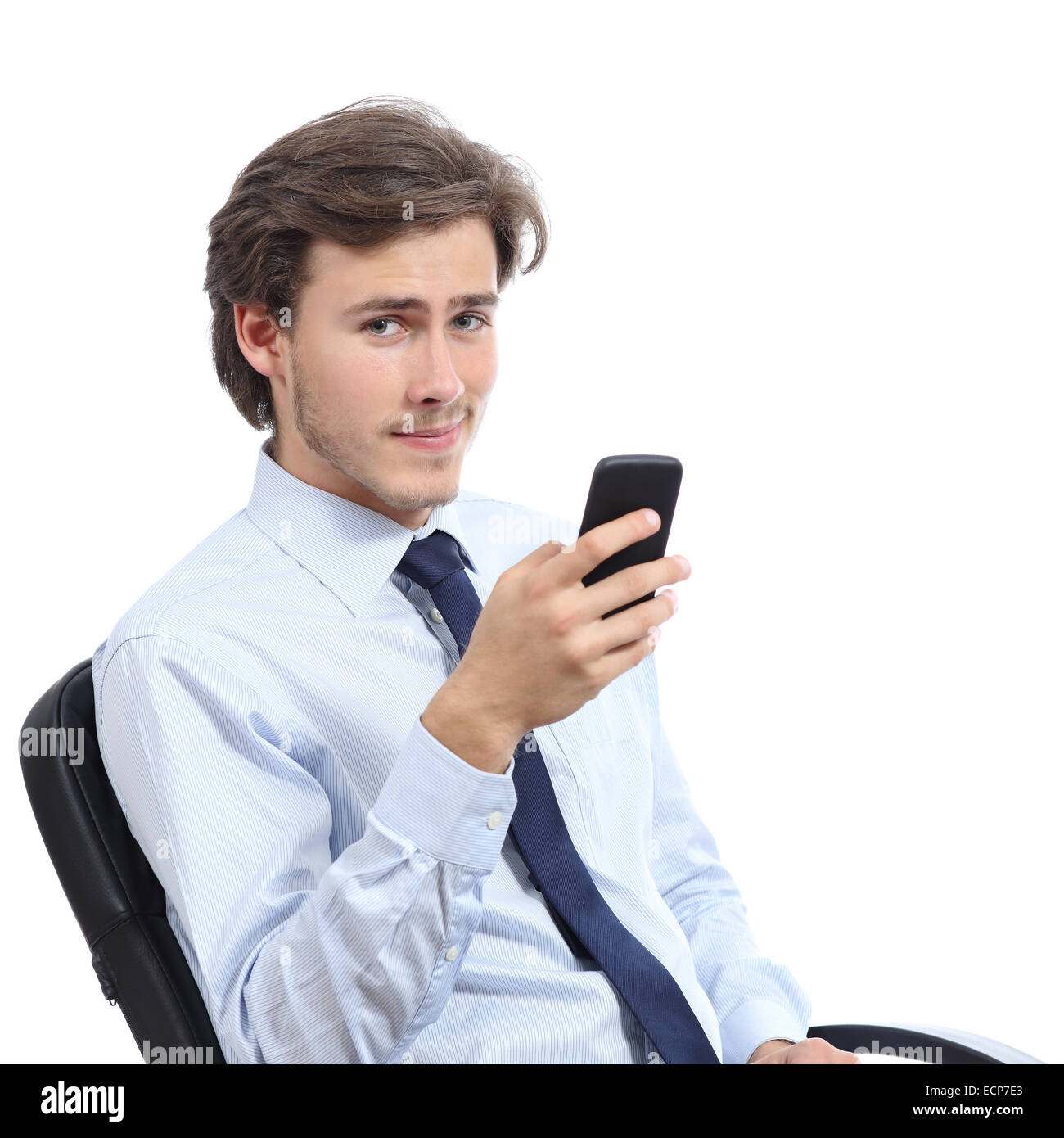 Young businessman sitting on a chair using a smart phone isolated on a ...