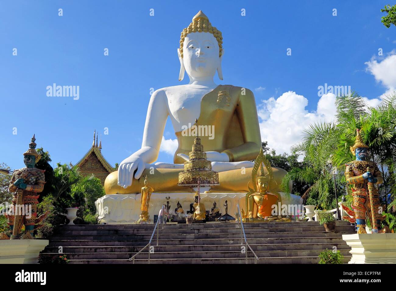 Buddha statue at Wat Doi Kham. Buddhist temple decoration in Chiang Mai ...