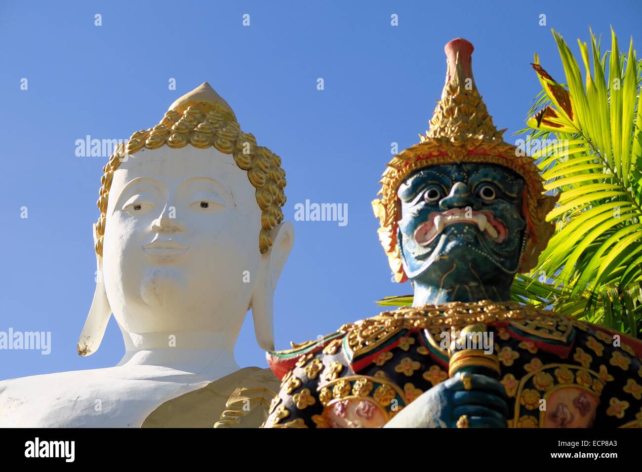 Buddha statue at Wat Doi Kham. Buddhist temple decoration in Chiang Mai ...