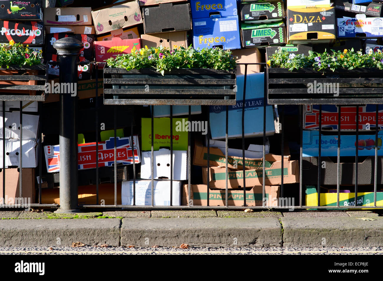 Cardboard fruit and vegetable boxes stacked at market stall Stock Photo ...