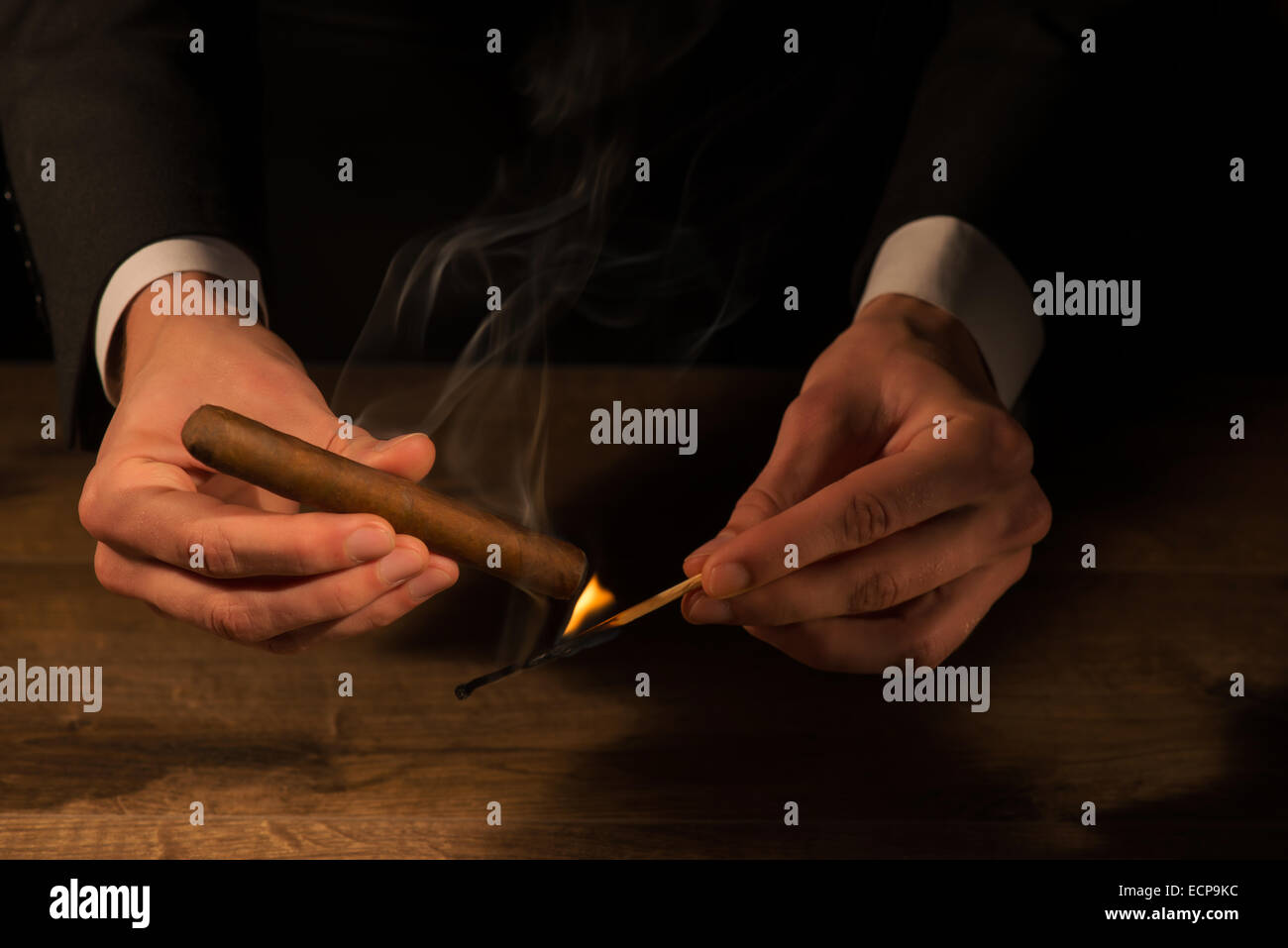 Havana man lighting cigar hi-res stock photography and images - Alamy