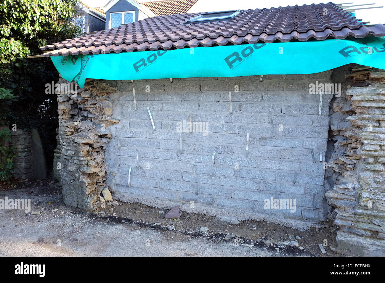 Partially build wall construction on a house extension in the suburbs ...