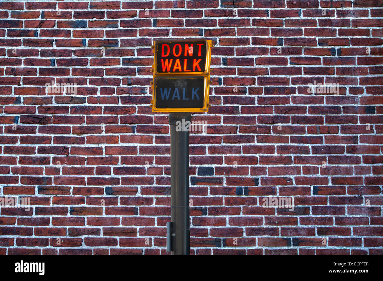 Stop sign on a wall Stock Photo - Alamy