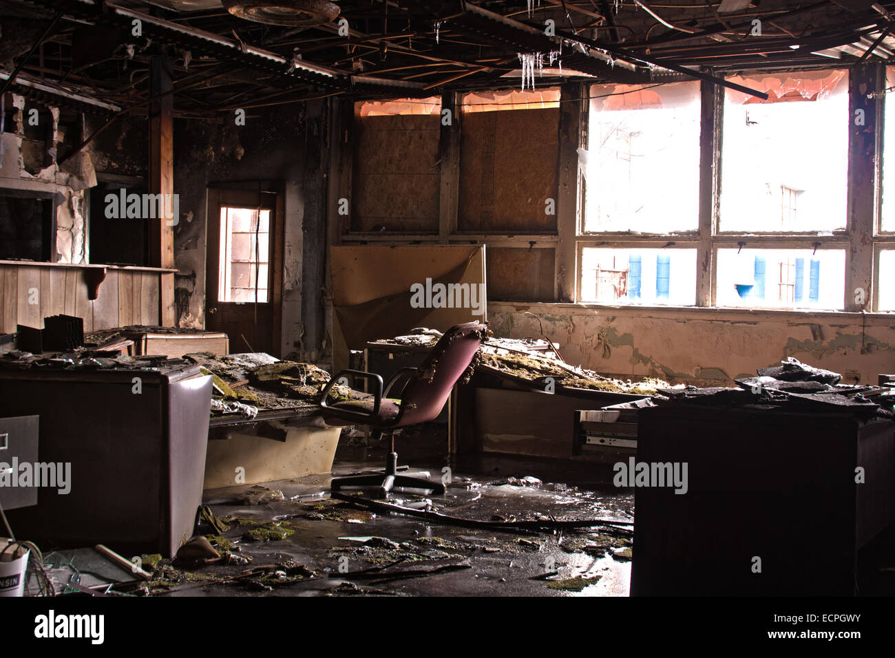 Abandoned office space with leaky roof Stock Photo - Alamy