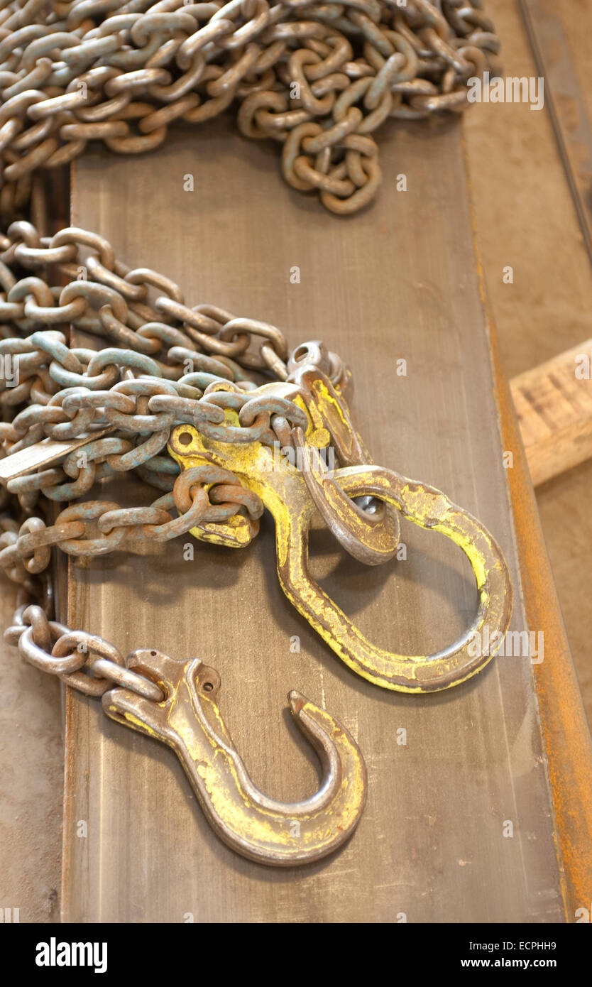 Chain and hook for overhead crane in a metal fabrication shop Stock ...