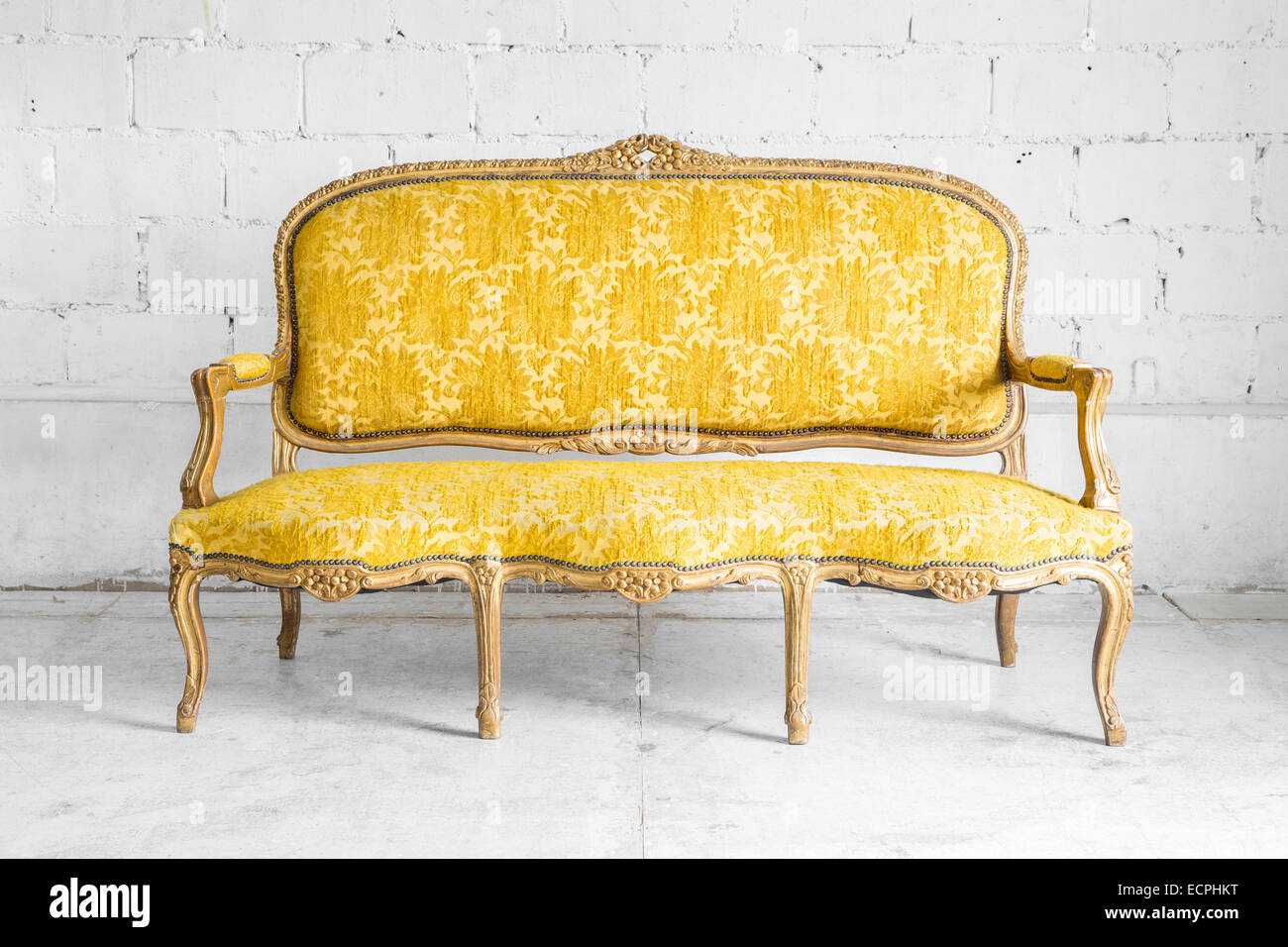Yellow classical style Armchair sofa couch in vintage room Stock Photo ...