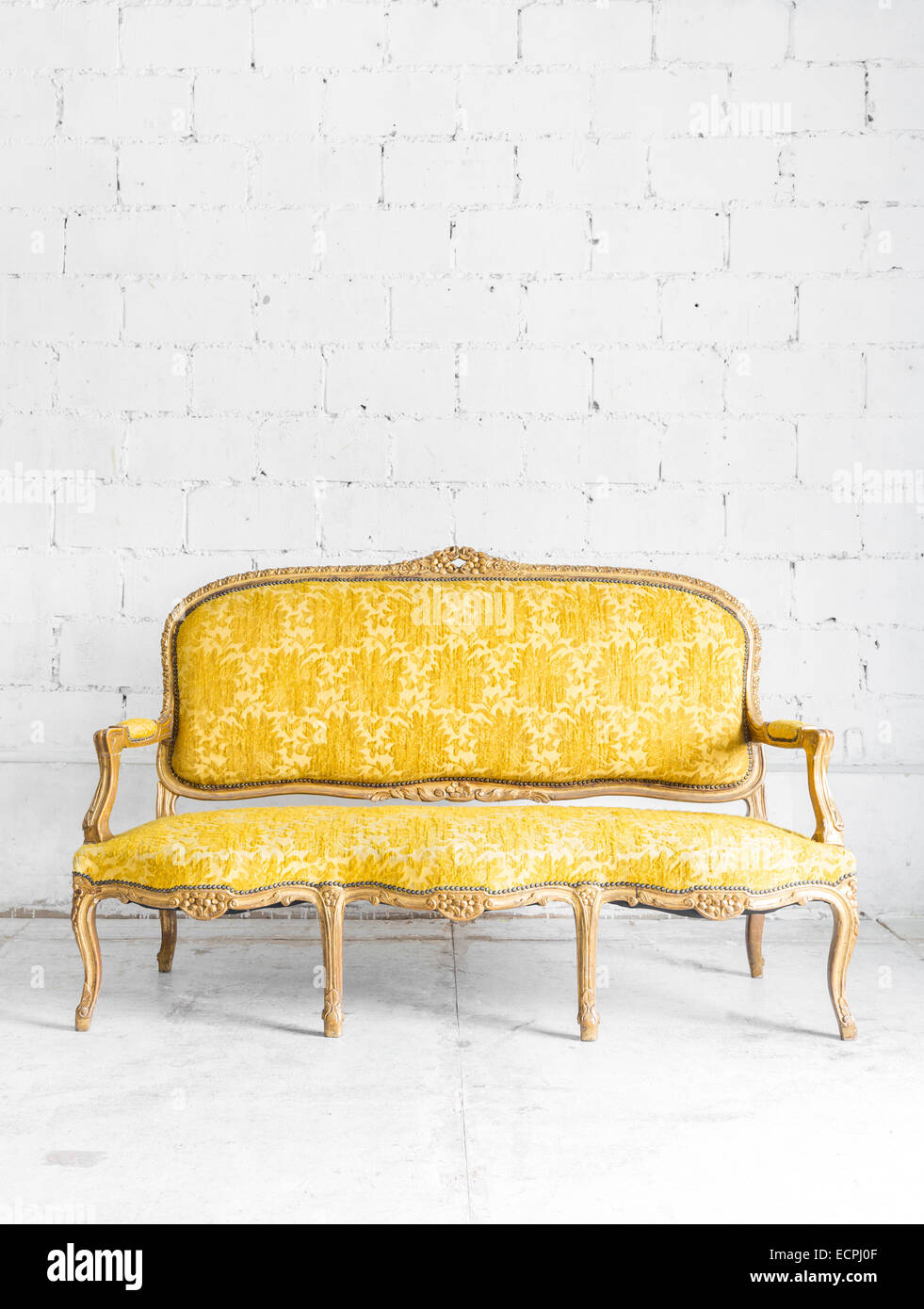 Yellow classical style Armchair sofa couch in vintage room Stock Photo ...