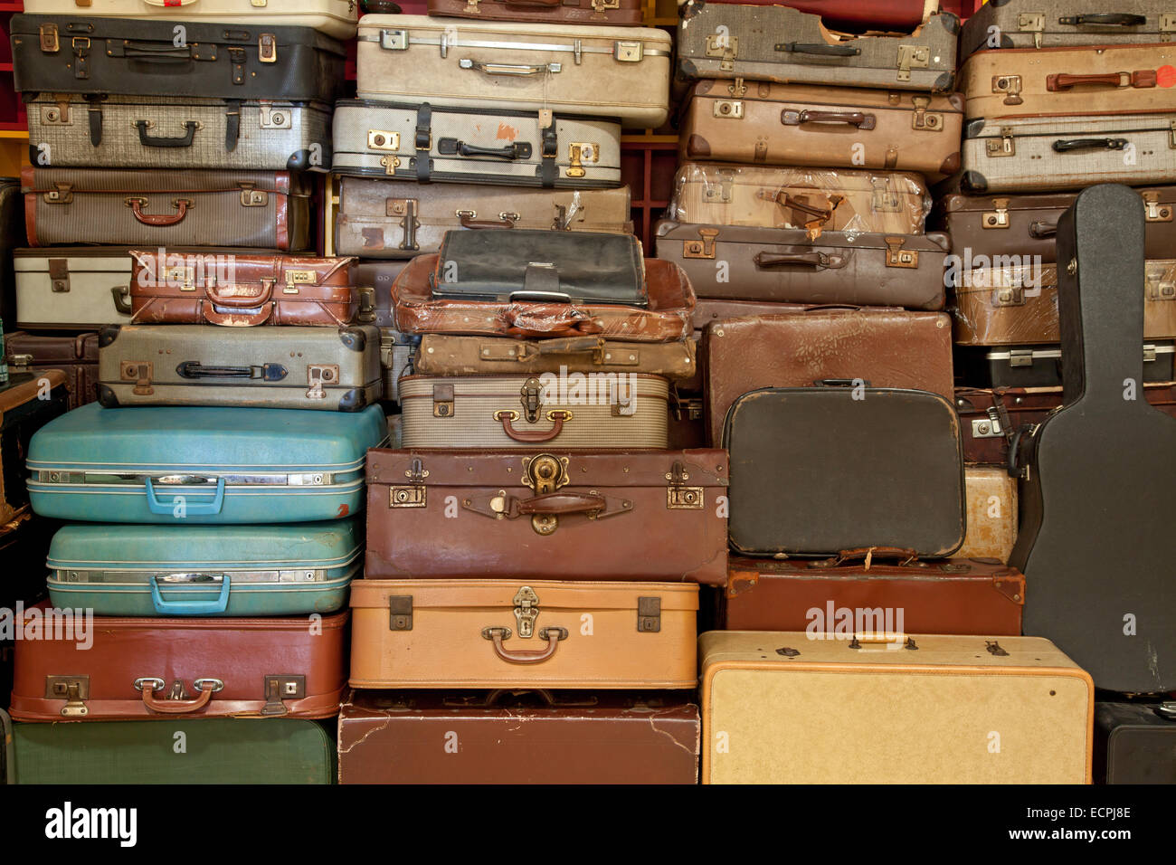 Stack of Vintage retro suitcase and briefcase as background Stock Photo ...