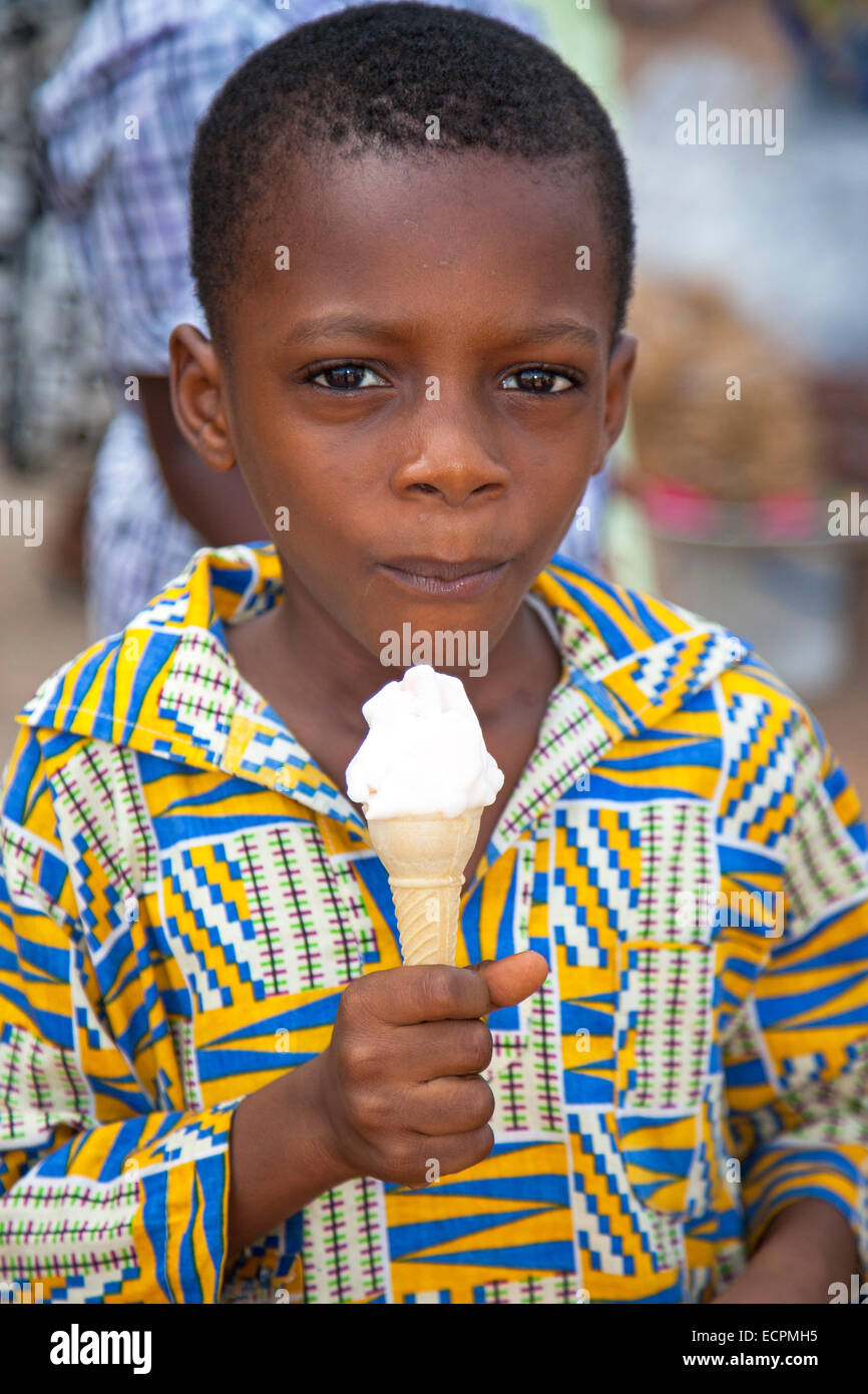 Boy eating ice cream, Accra, Ghana, Africa Stock Photo - Alamy